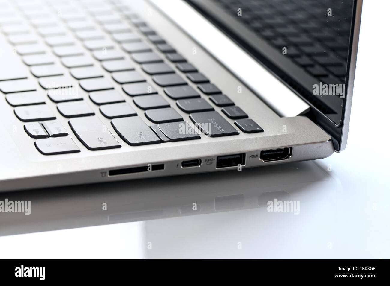 Laptop in white background Stock Photo - Alamy