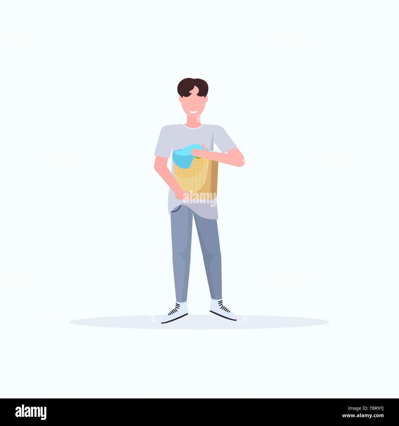 man holding basket with dirty clothes guy doing housework concept male ...
