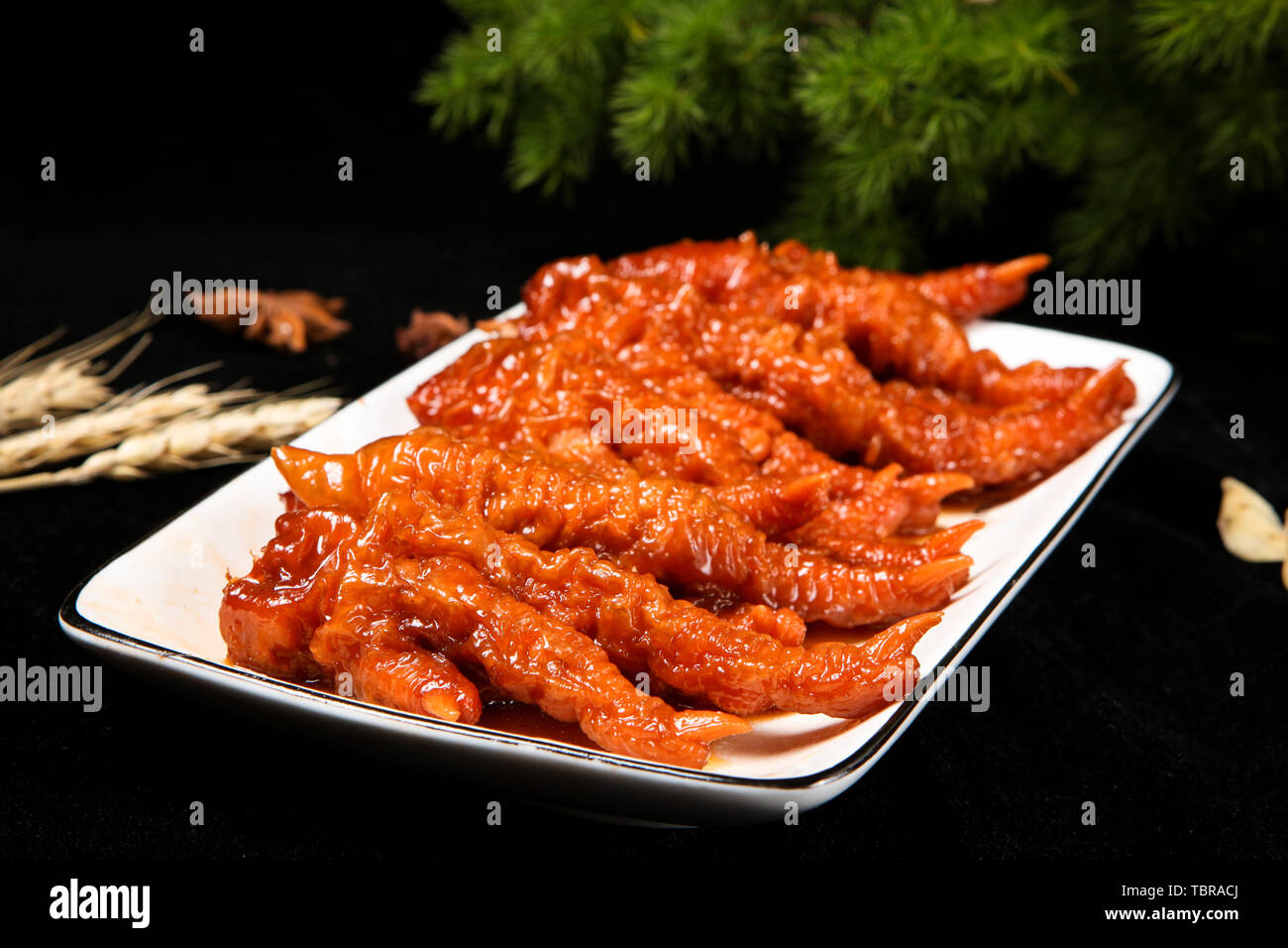 Tiger skin, phoenix claws, halogen chicken claws Stock Photo - Alamy