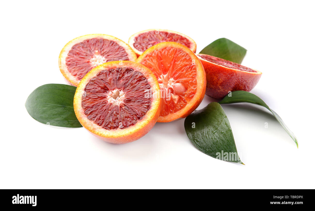 Cut blood oranges on white background Stock Photo - Alamy