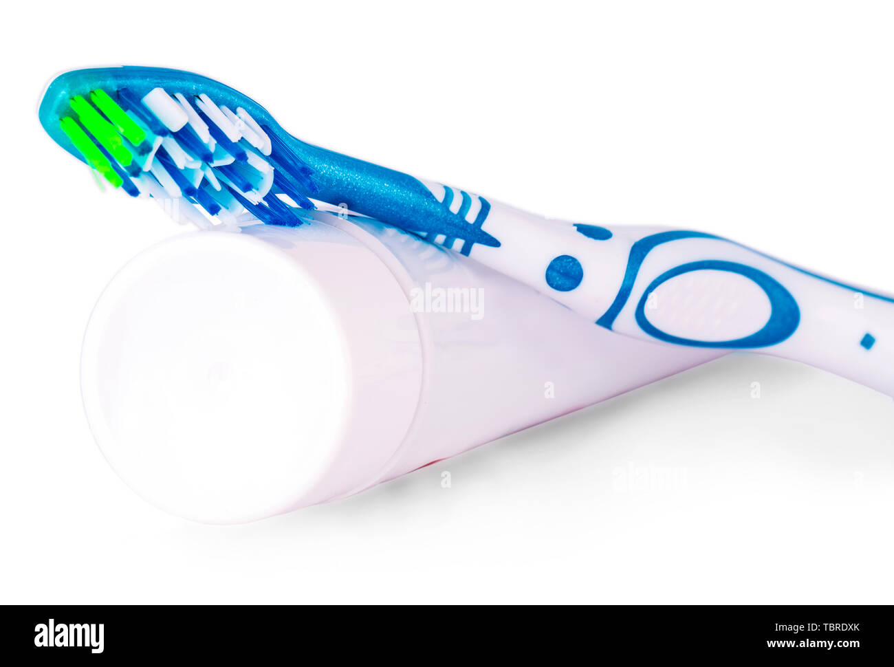Toothbrush and toothpaste on white background Stock Photo - Alamy