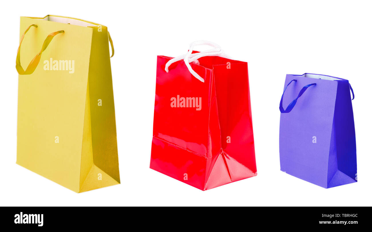 Three colored shopping bags isolated on white background Stock Photo ...