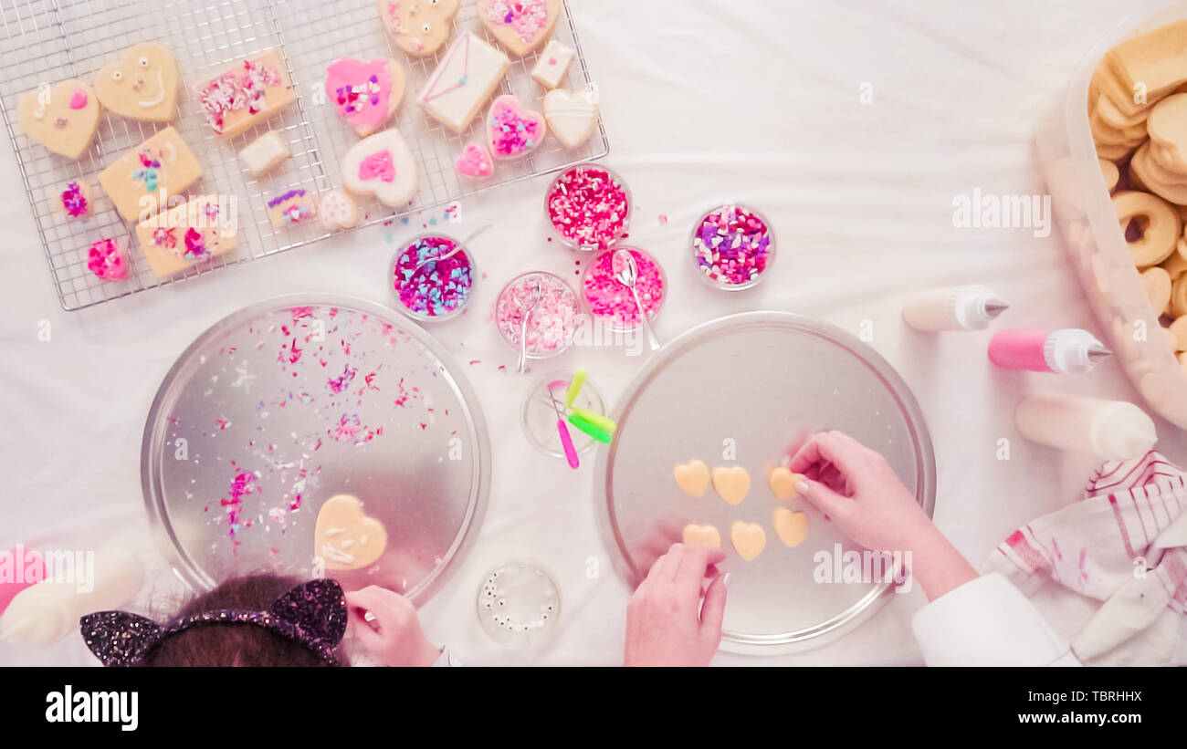 Flat lay. Step by step. Decorating sugar cookies with royal icing and ...