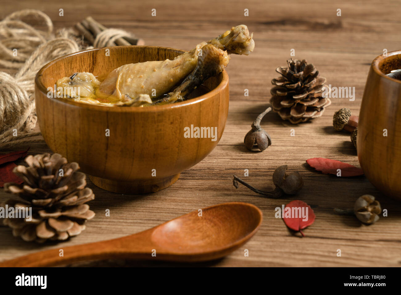 Chicken soup with wood pattern background Stock Photo - Alamy