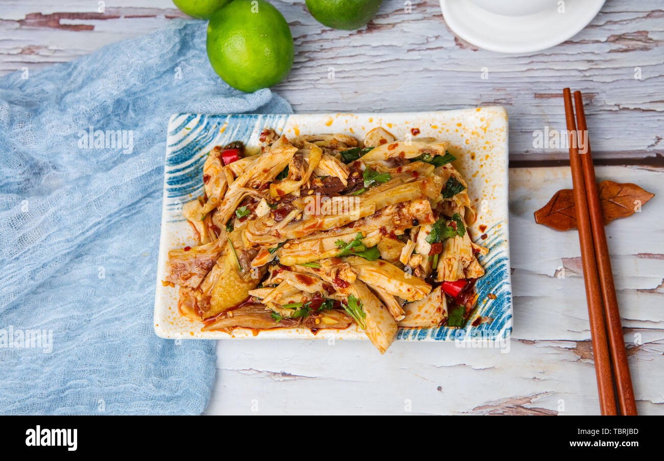 drooling chicken, stick chicken Stock Photo - Alamy