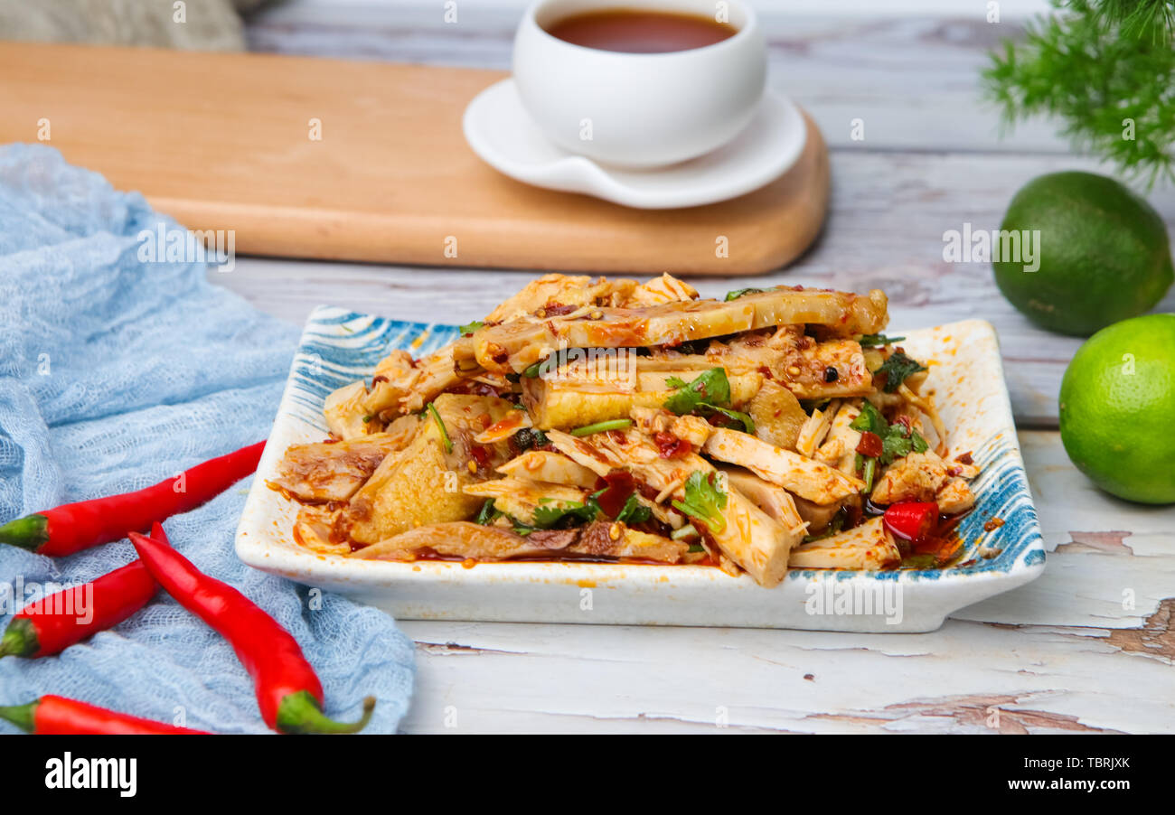 drooling chicken, stick chicken Stock Photo - Alamy
