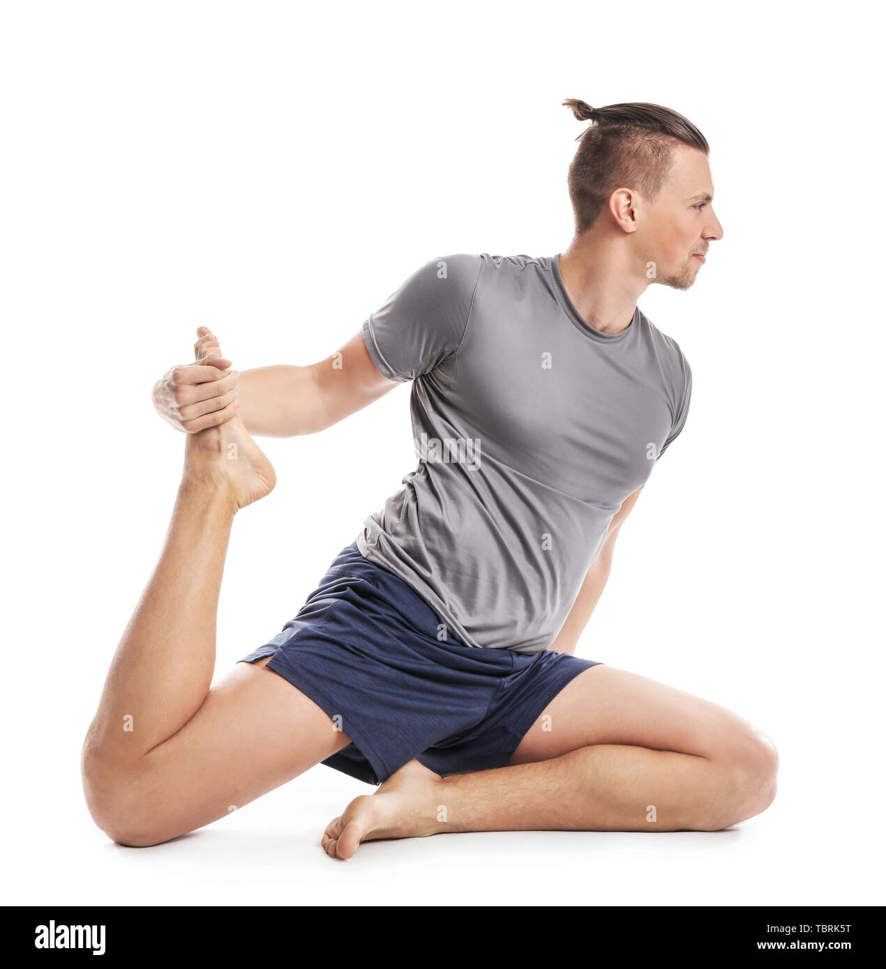 Man practicing yoga wellness Cut Out Stock Images & Pictures - Alamy