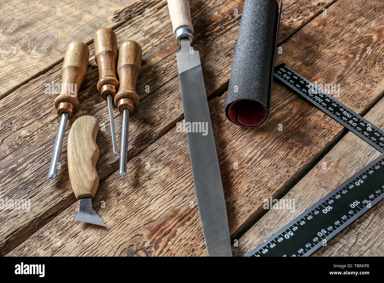 Set of carpenter's tools on wooden background Stock Photo - Alamy