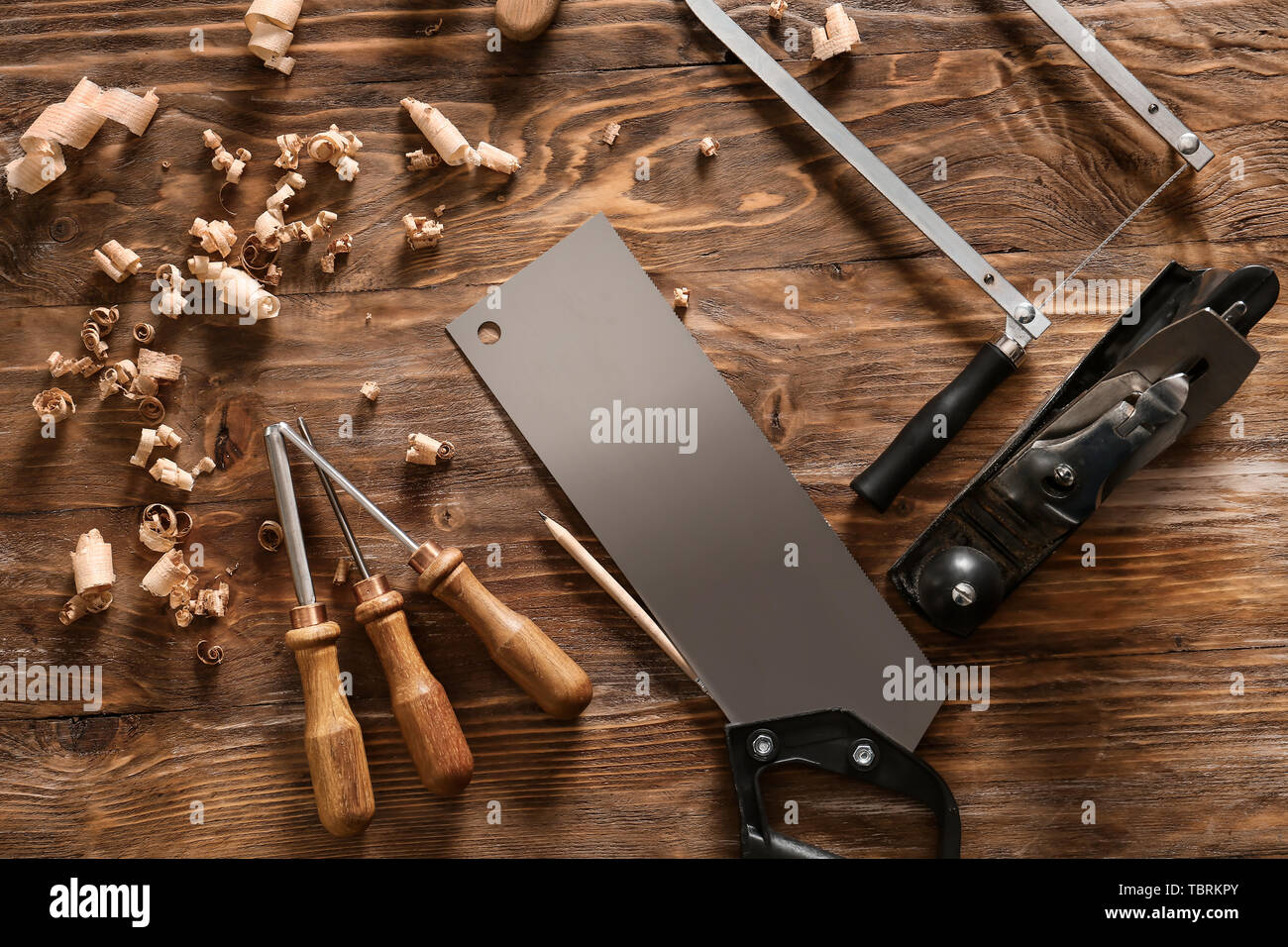 Set of carpenter's tools on wooden background Stock Photo - Alamy