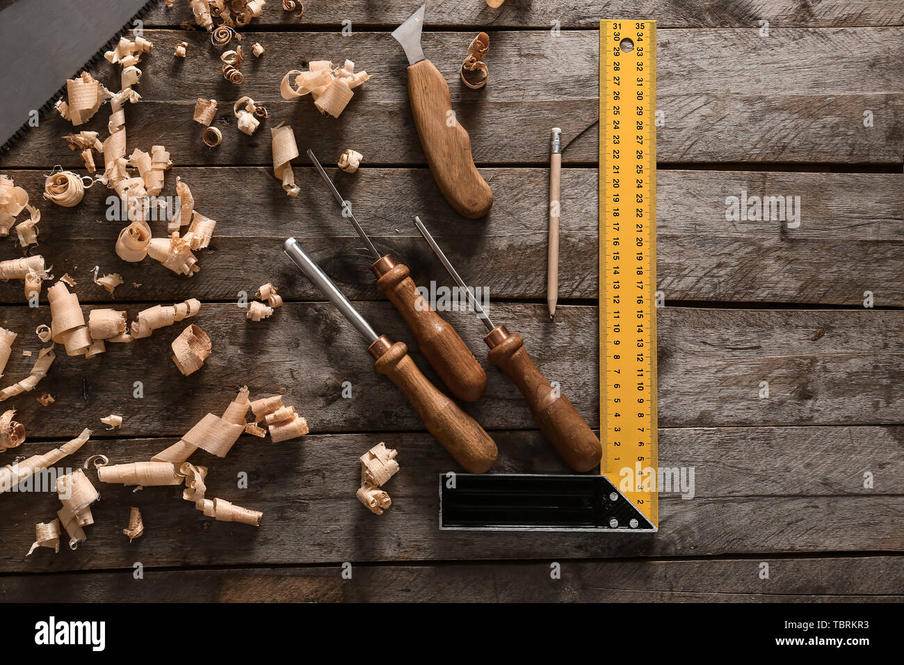 Set of carpenter's tools on wooden background Stock Photo - Alamy