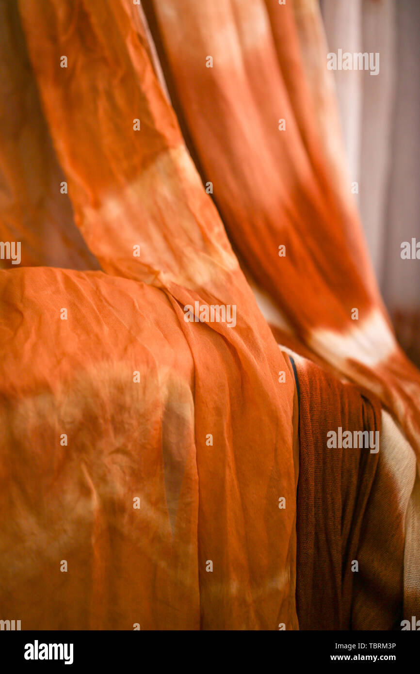 Hand stroking soft silk and fabric Stock Photo - Alamy