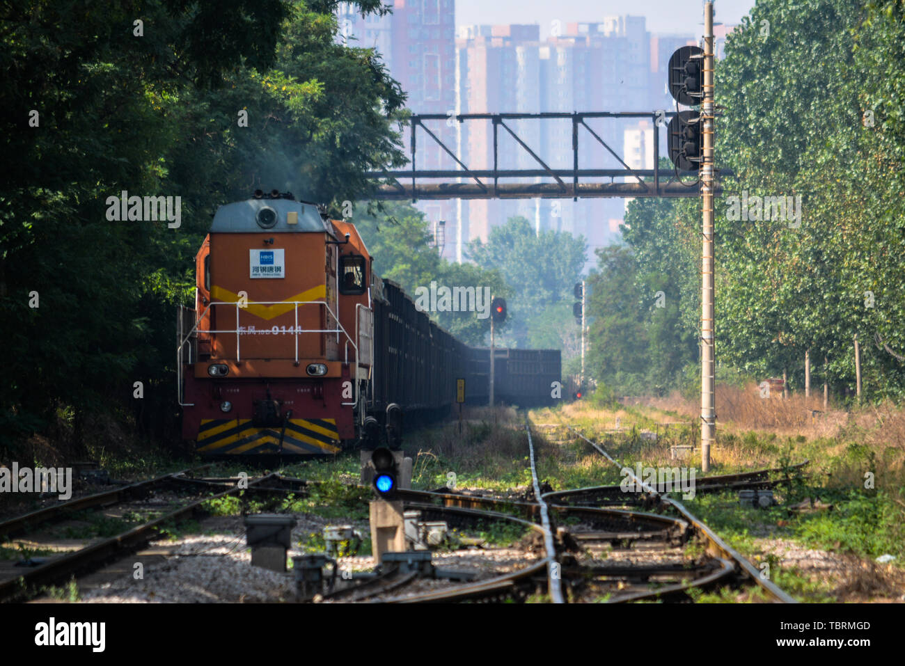 A railway shuttling between cities Stock Photo - Alamy