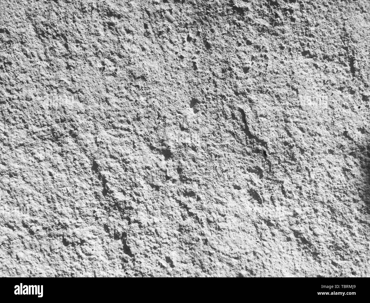 Rough lime wall background material Stock Photo - Alamy