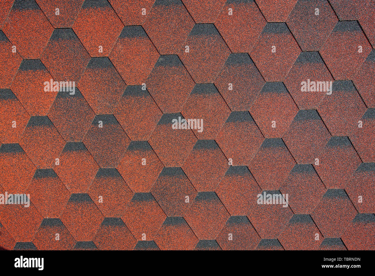 Close up view of new roof red shingles Stock Photo - Alamy
