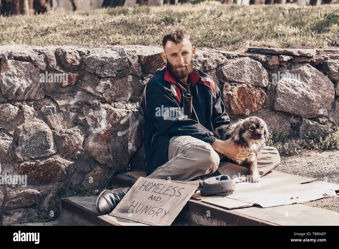 Homeless man with dog hi-res stock photography and images - Alamy