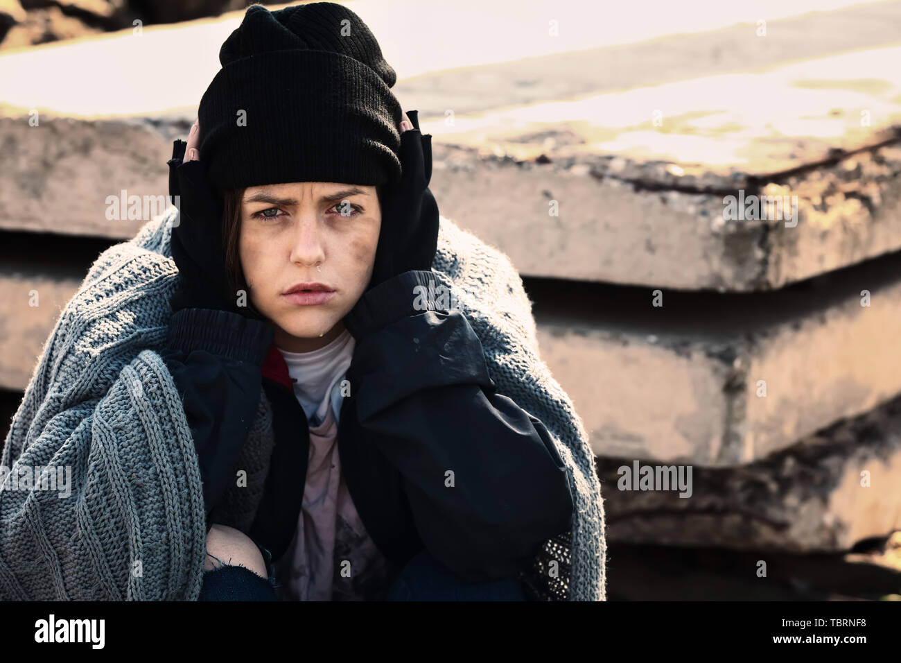 Portrait of sad homeless woman outdoors Stock Photo - Alamy