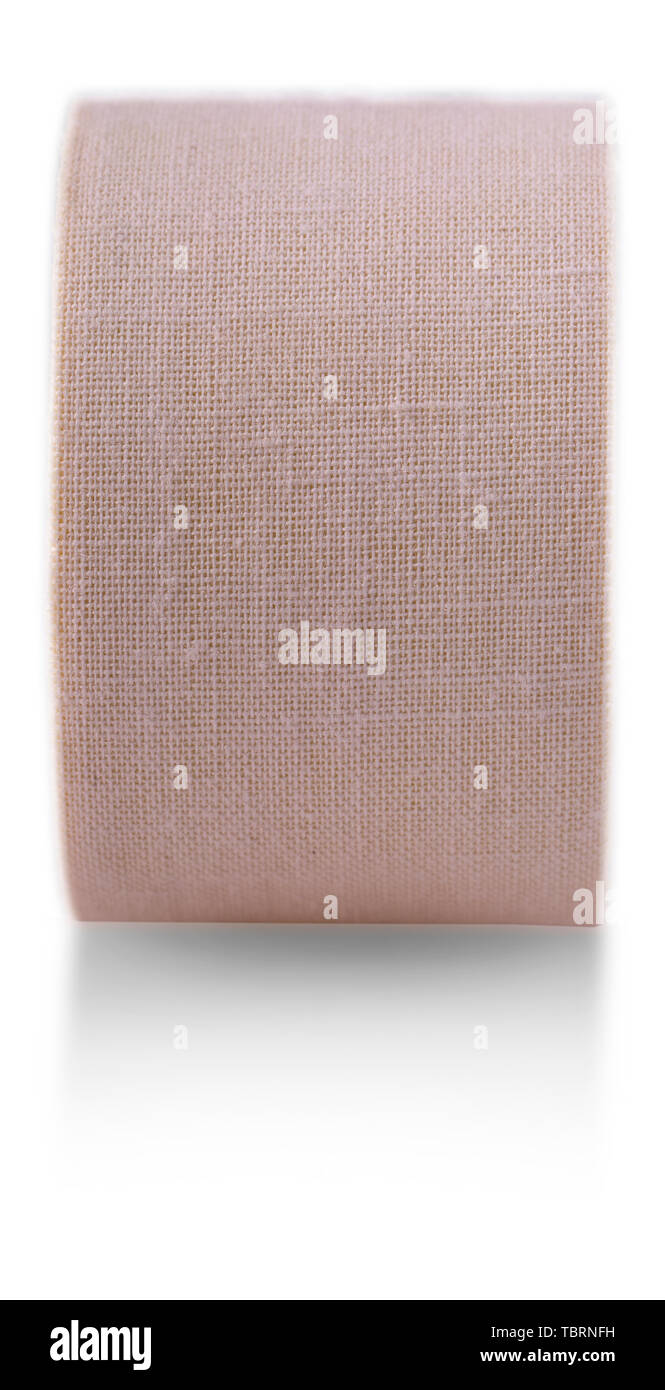 Roll of medical sticking plaster isolated on white Stock Photo - Alamy