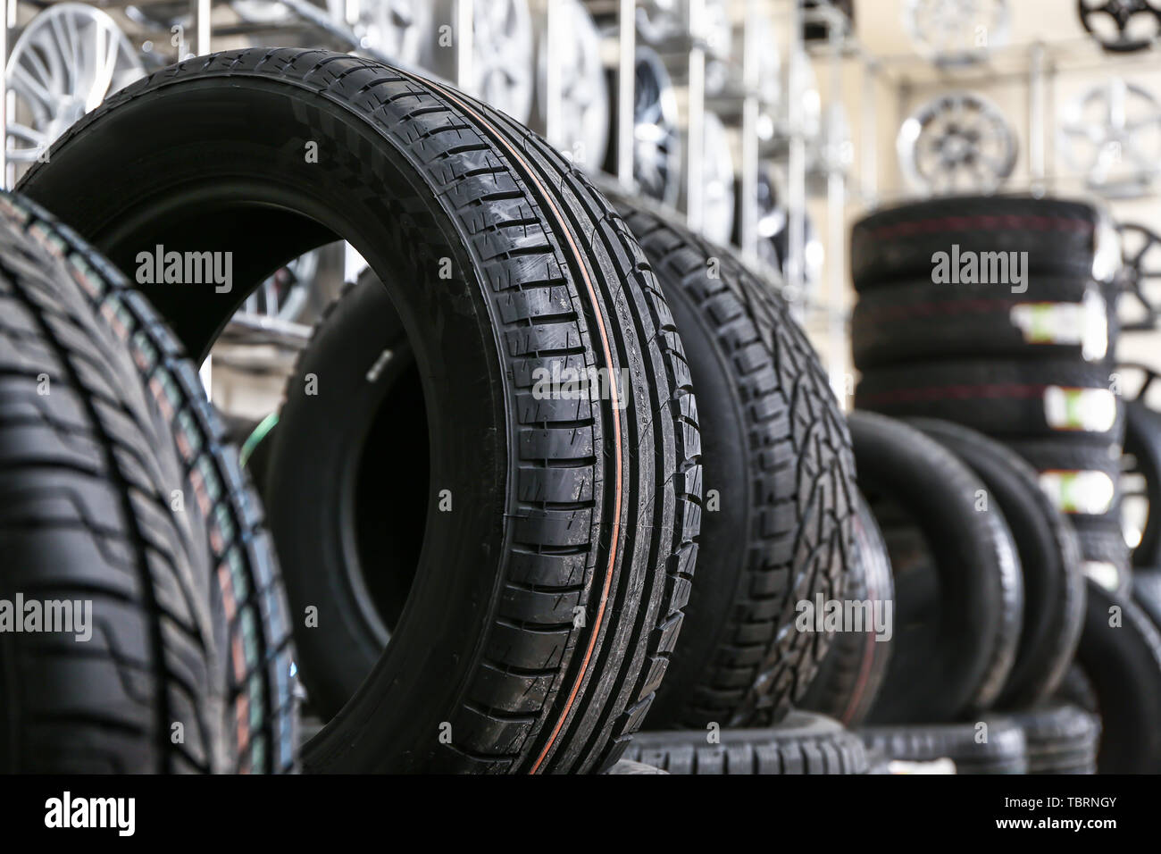 Car tires in automobile store Stock Photo - Alamy