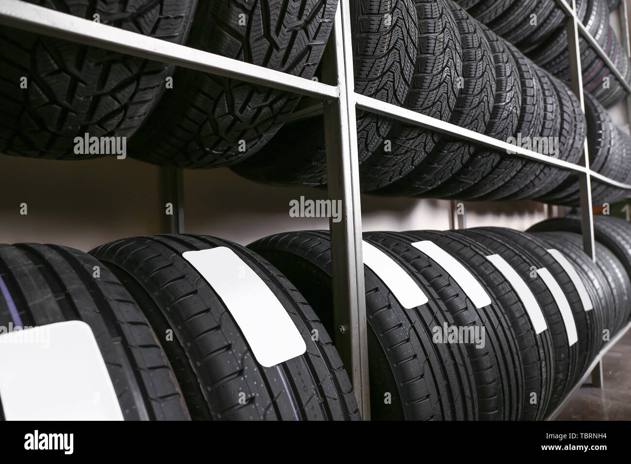 Car tires in automobile store Stock Photo - Alamy