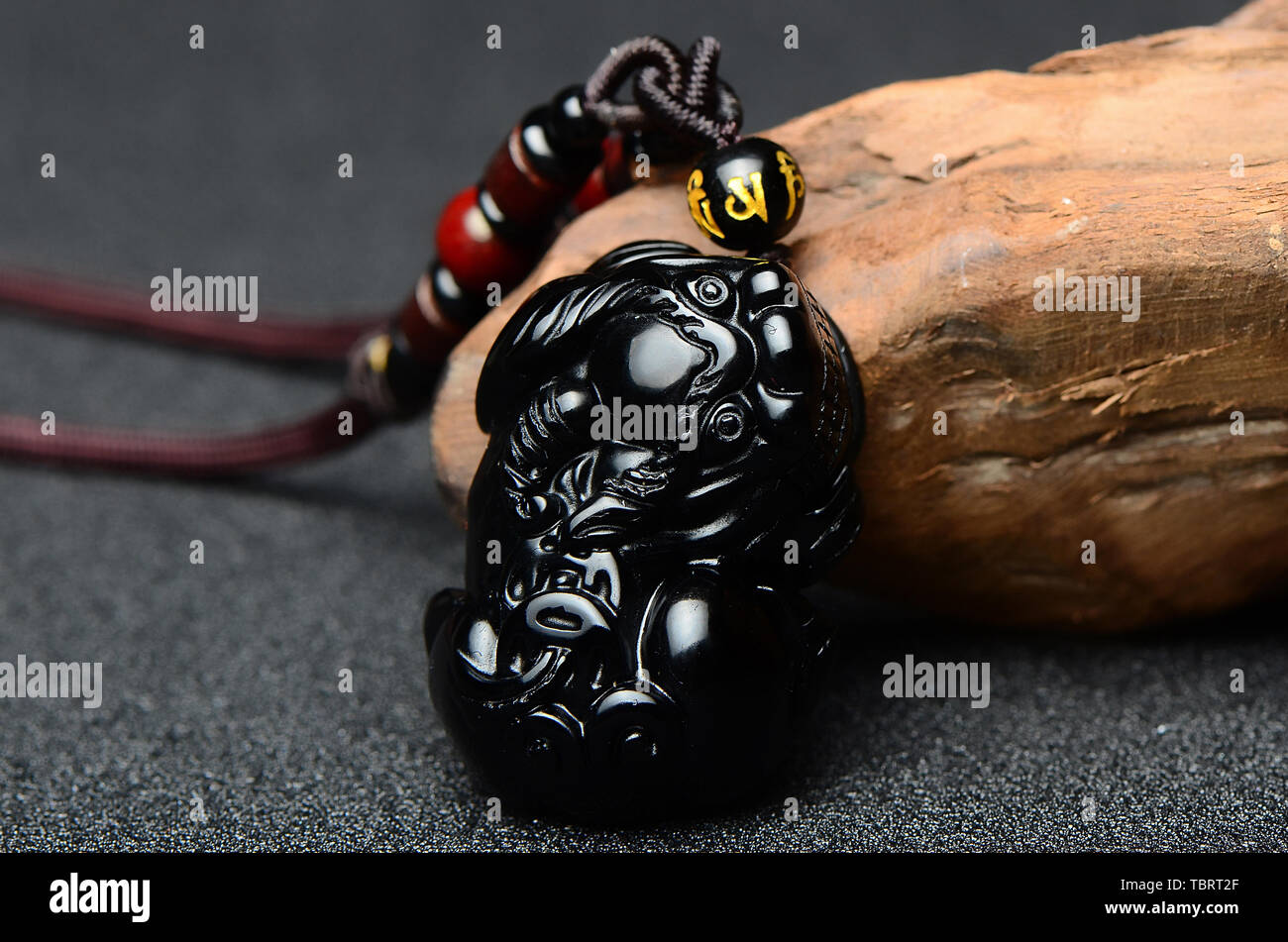 Obsidian Obsidian Pixiu pendant Stock Photo - Alamy