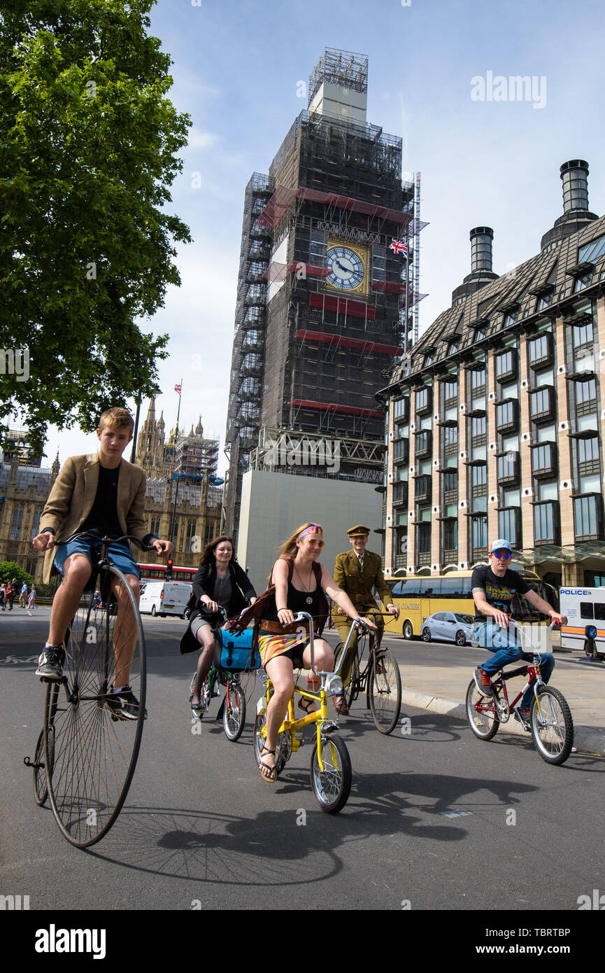 EDITORIAL USE ONLY (left to right) Tom Thomson rides a Penny Farthing ...