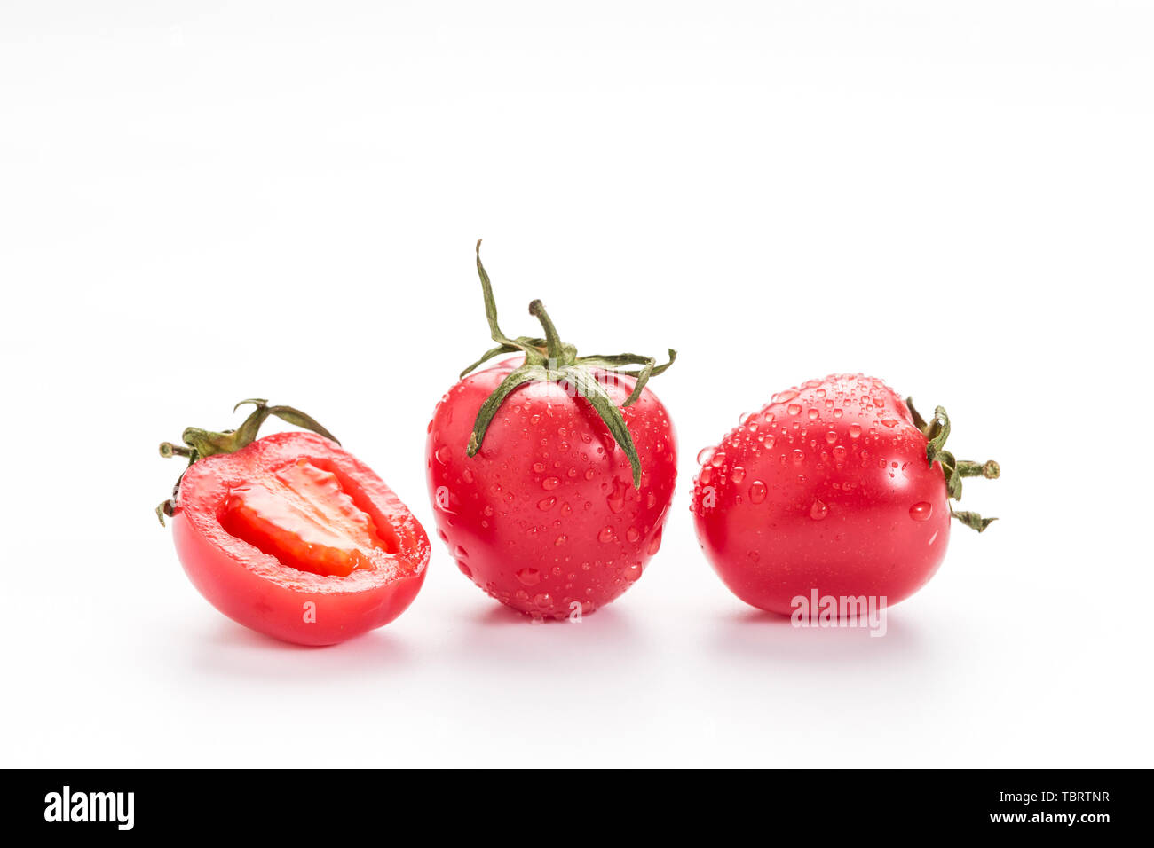 Delicious little tomatoes Stock Photo - Alamy