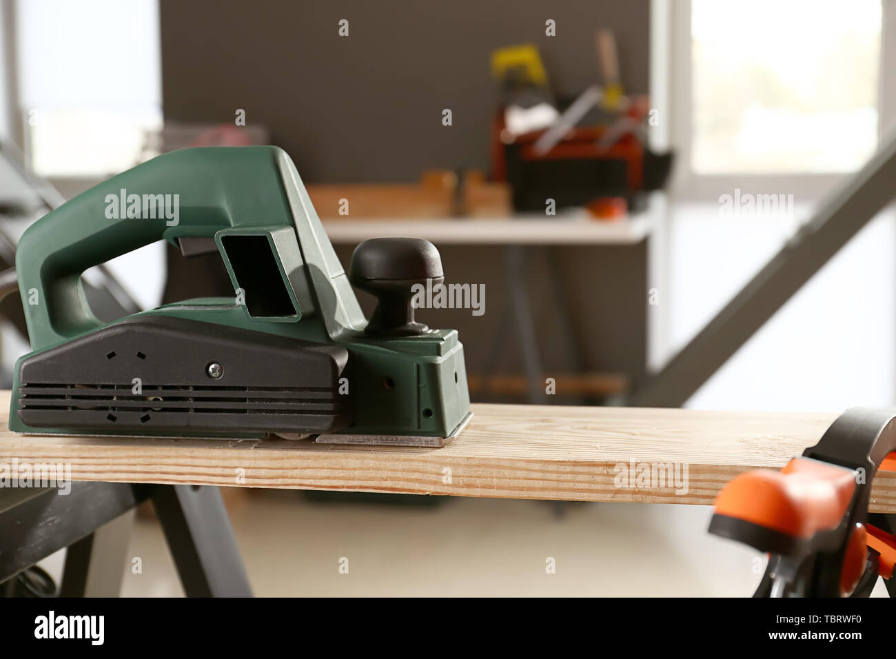 Electric planer in carpenter's workshop Stock Photo - Alamy