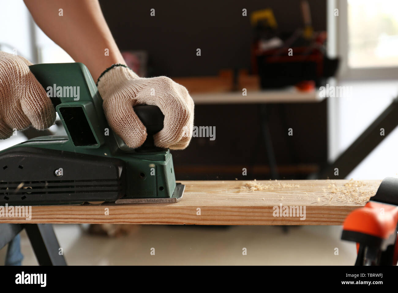 Carpenter using planer male planer hi-res stock photography and images ...
