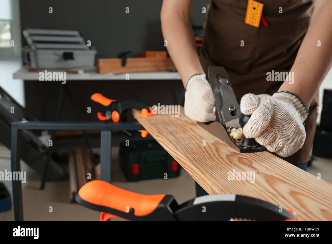 Carpenter using planer male planer hi-res stock photography and images ...