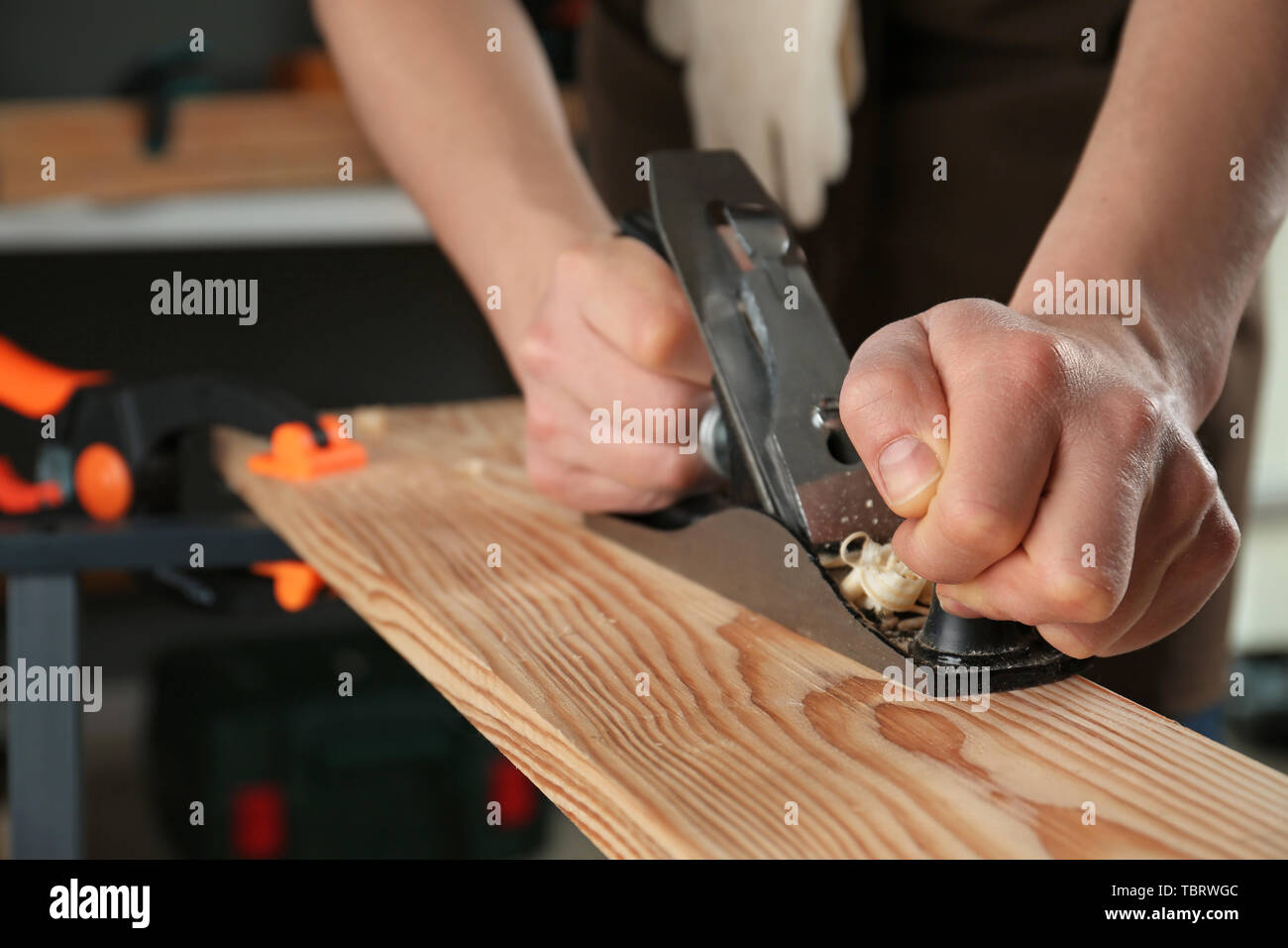 Carpenter using planer male planer hi-res stock photography and images ...