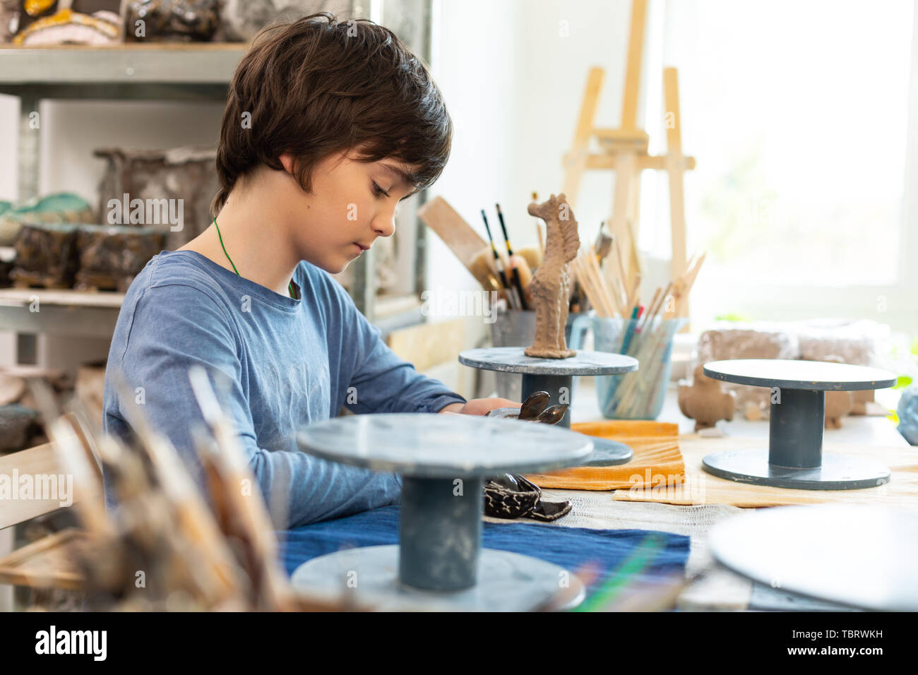 Child clay modeling class hi-res stock photography and images - Alamy