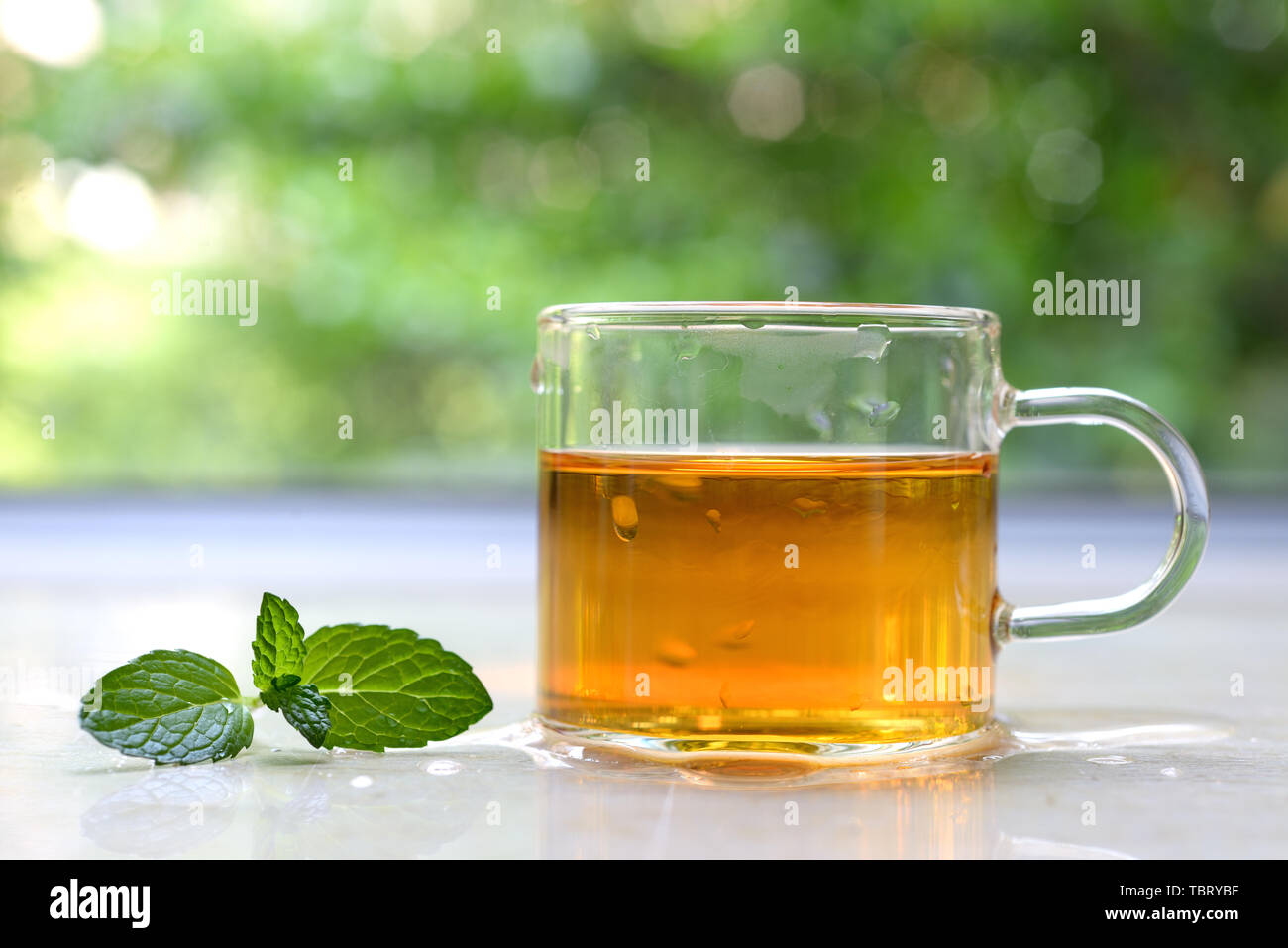 Green tea in the glass Stock Photo - Alamy