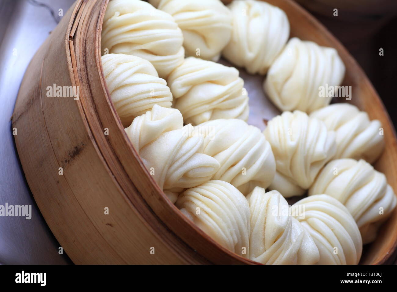 Family handmade steamed buns Stock Photo - Alamy
