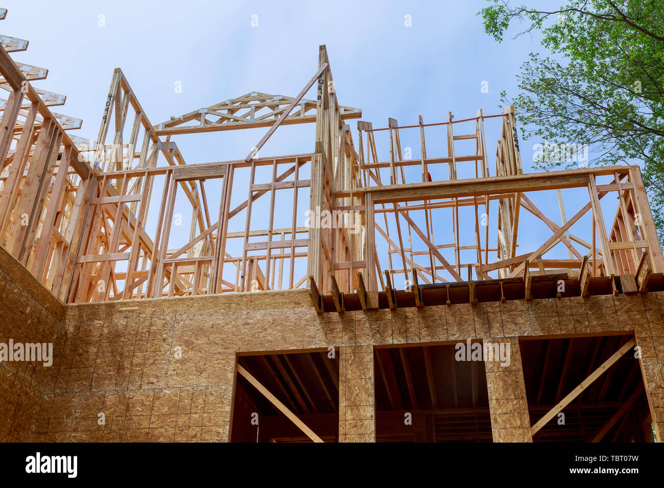 House beam frame for a progressing house building structure on a new ...