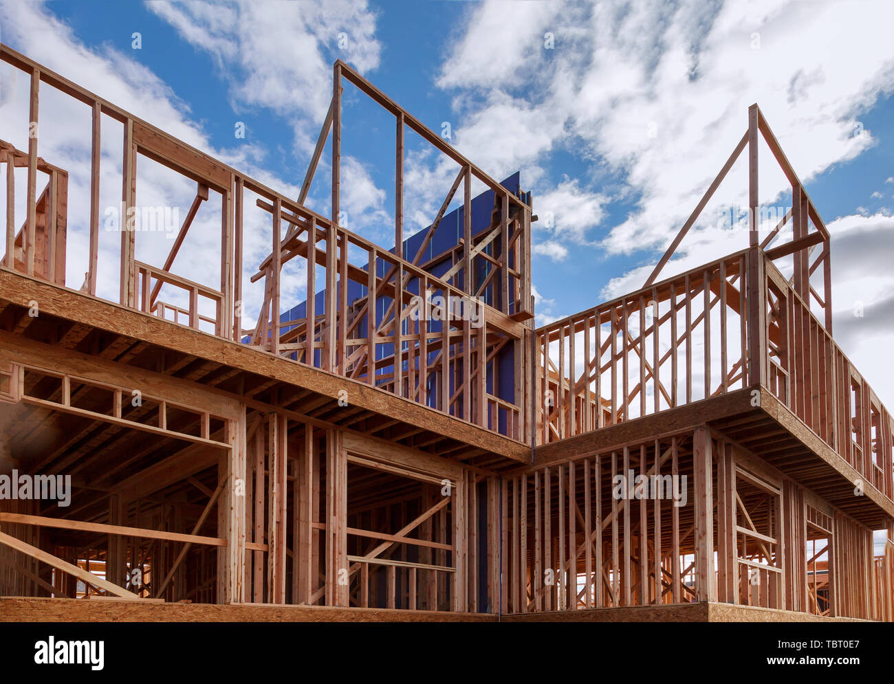 Building of New Home Construction exterior wood frame and beam ...