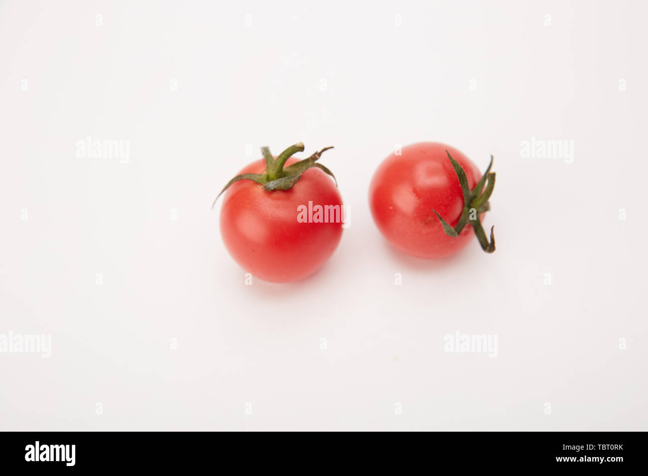 Little tomatoes, tomatoes Stock Photo - Alamy