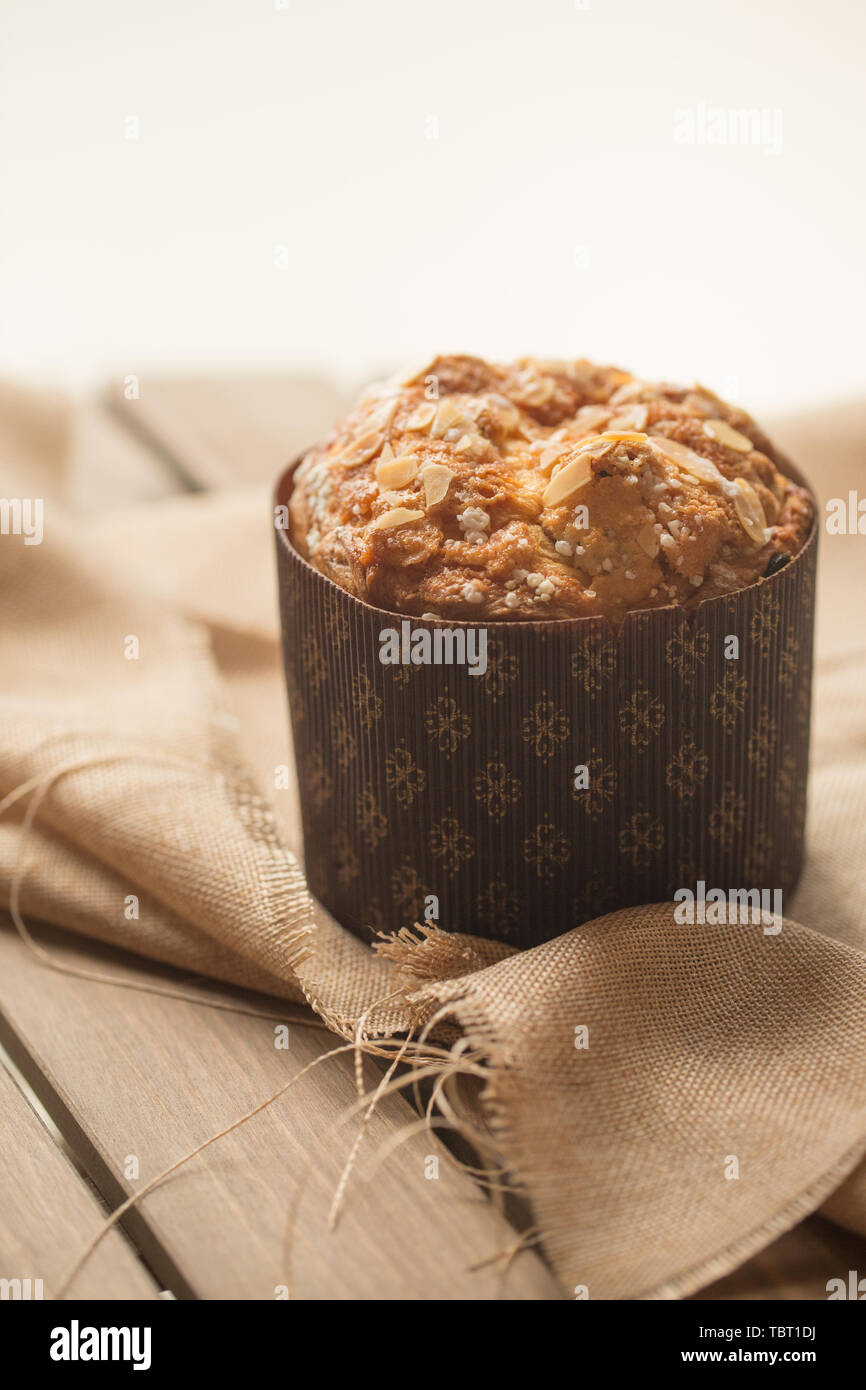 Italian Christmas bread panna tony penetone placed on wooden table on ...