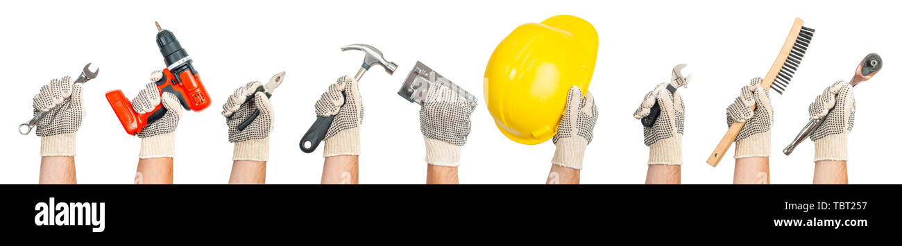 Hand tools. Hands holding construction tools isolated on white ...