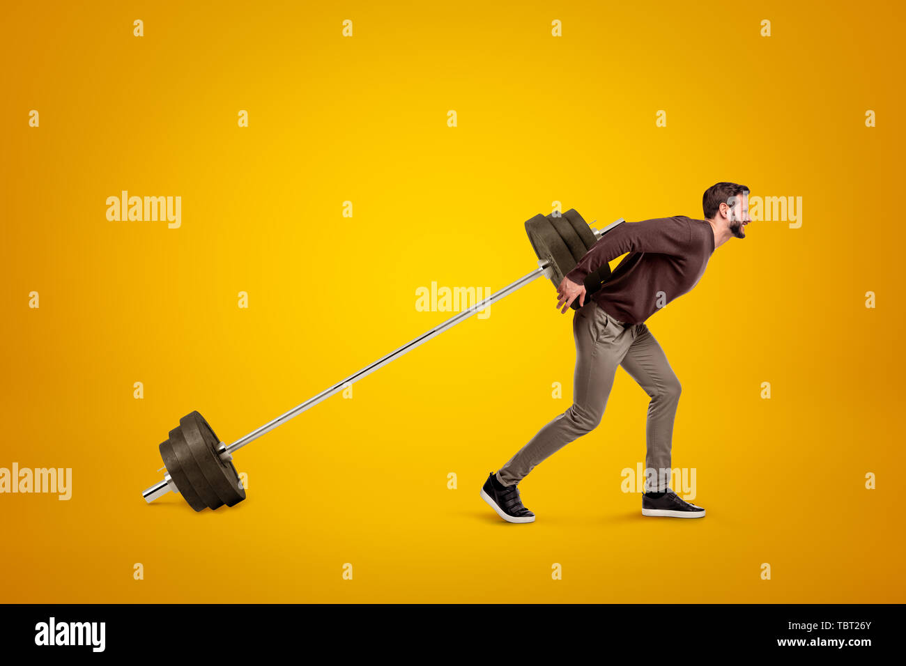 Strong person with bar bell hi-res stock photography and images - Alamy