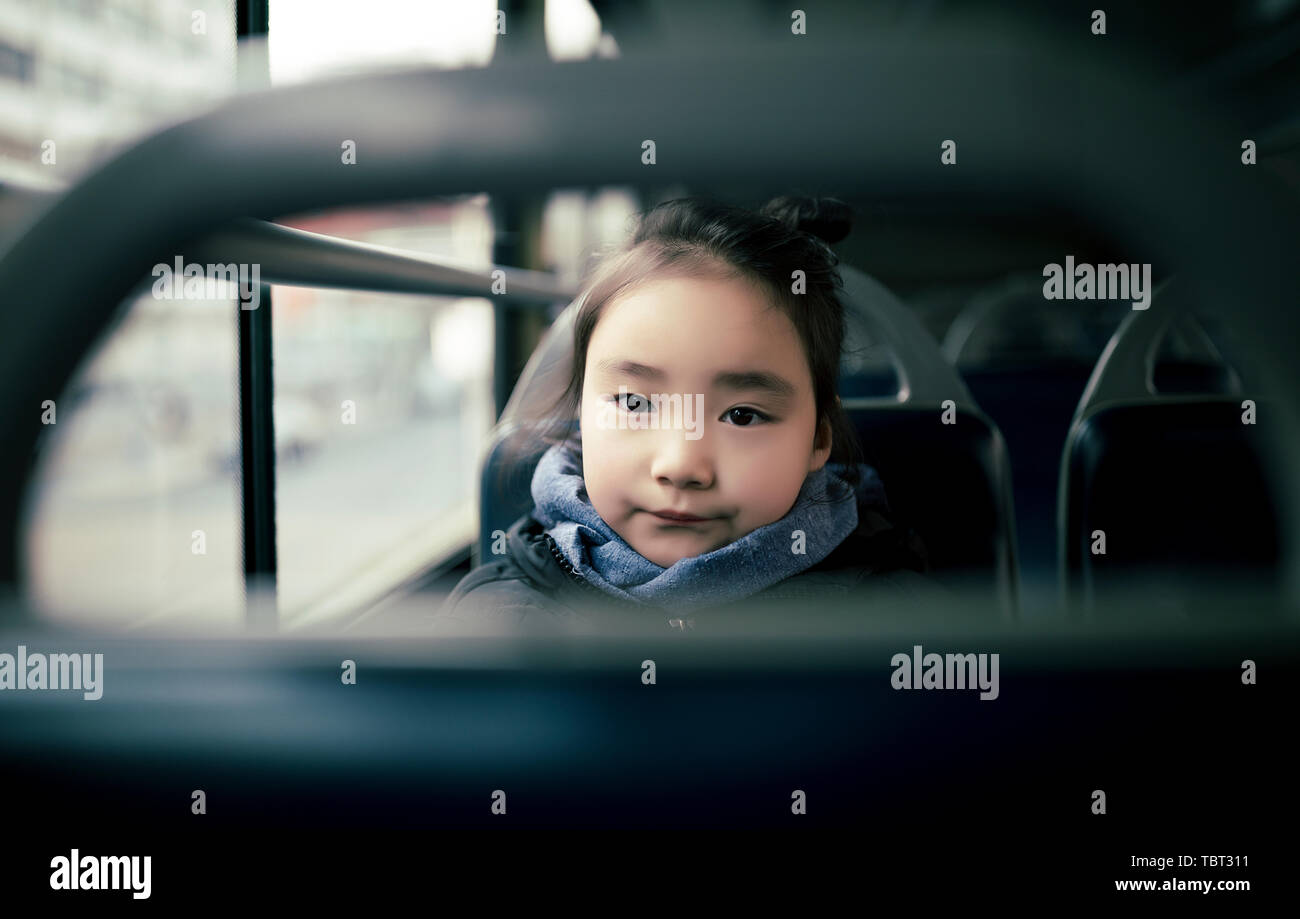Adorable little Asian girl on the bus Stock Photo - Alamy