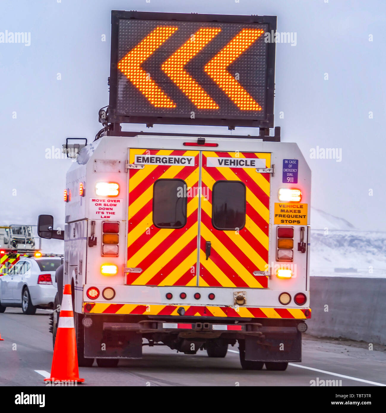 Square frame Back view of an emergency vehicle with an arrow board ...