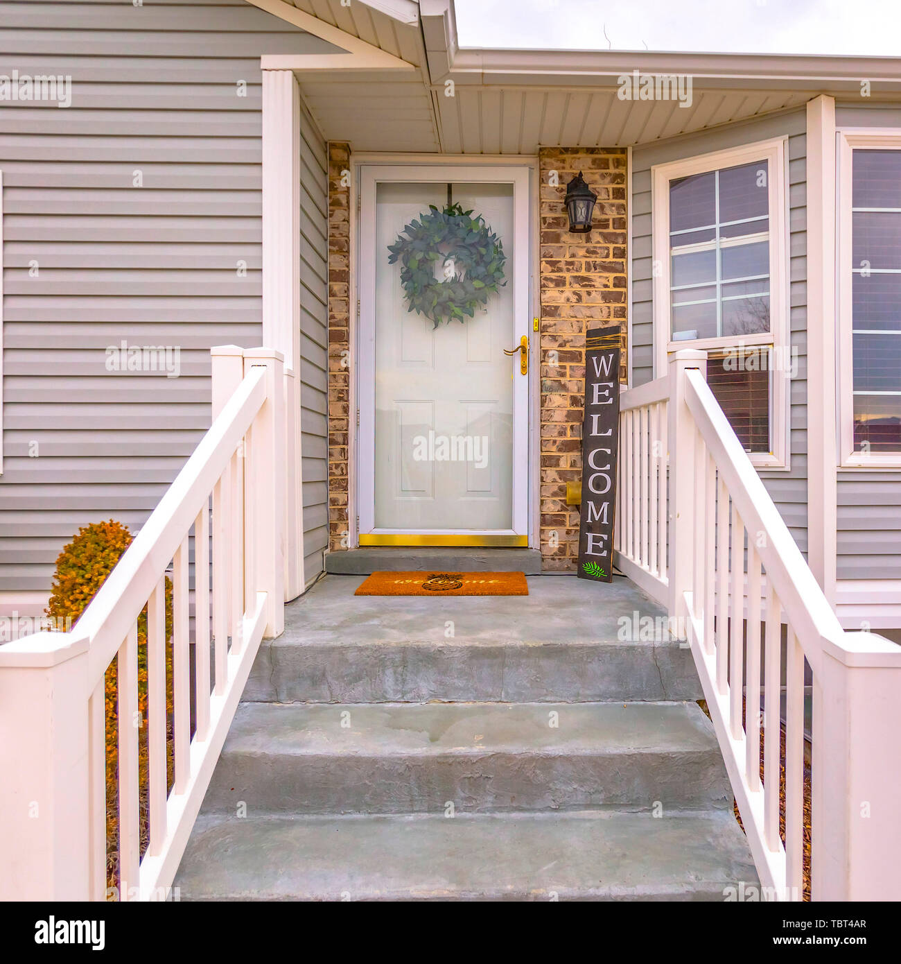 Square Pleasing home with stairs and half hexagon shaped window at the ...