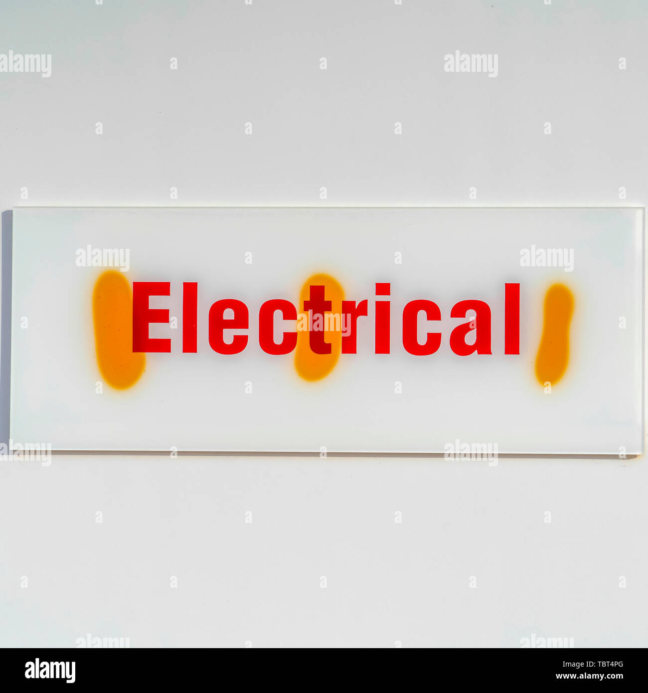 Square frame Close up of an electrical sign board against a white wall ...