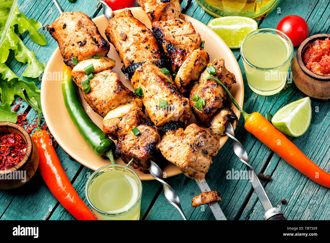 Skewers of pork shish kebab.Barbecue skewers with juicy meat.Summer ...