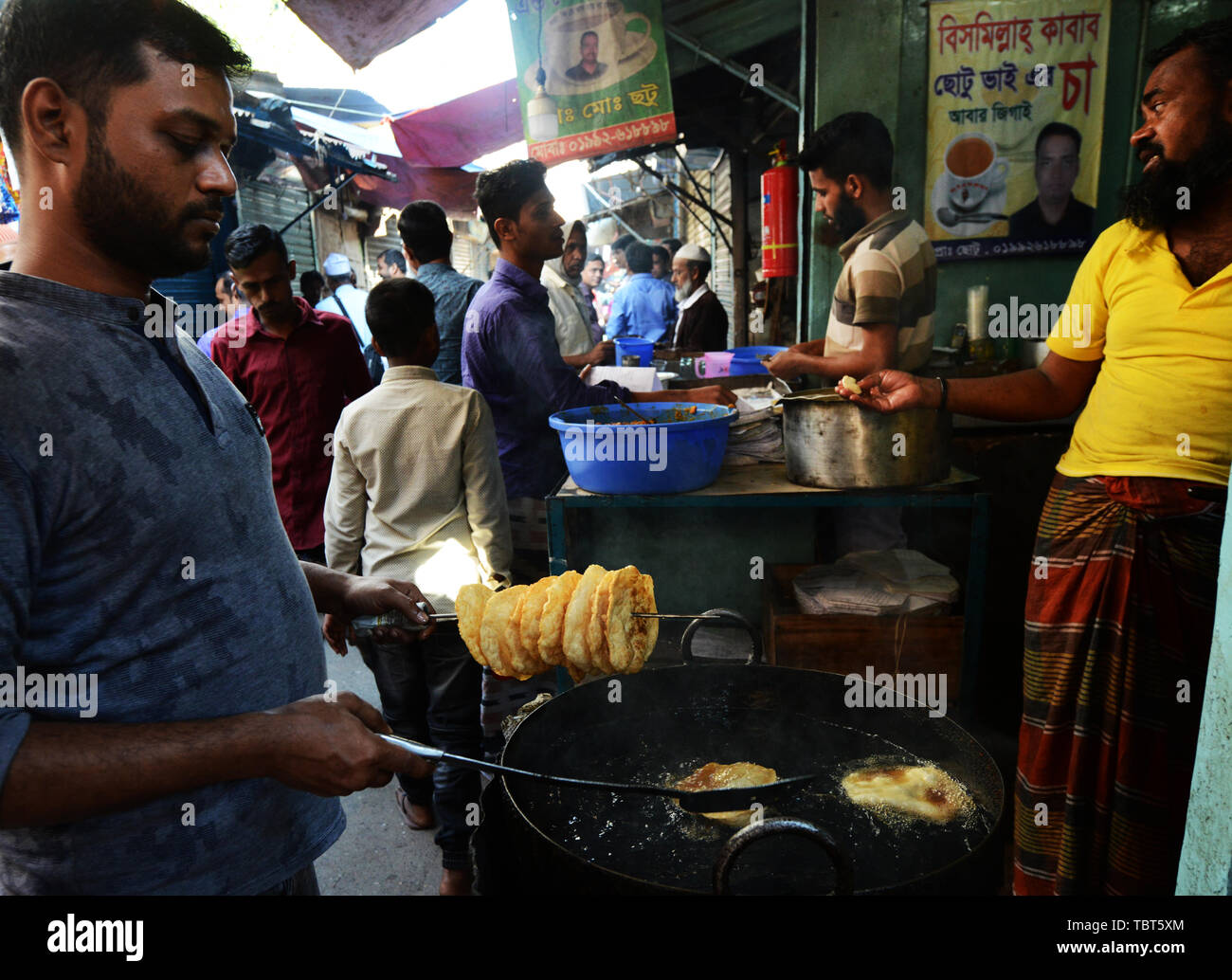Fried puri bread prepared inside the Geneva refugee camp in Dhaka Stock ...