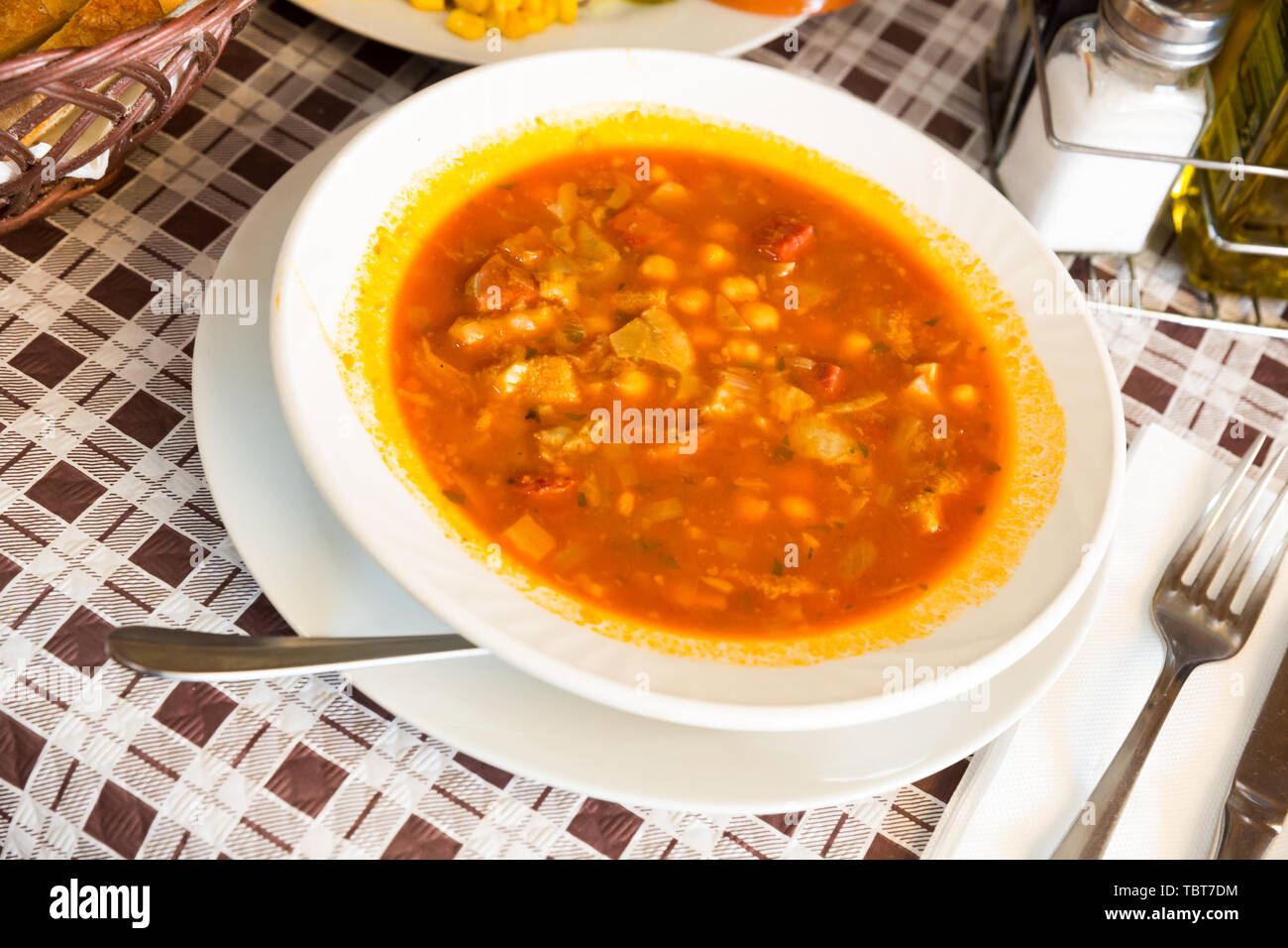 Spanish food callos with chickpeas, pepper and beef tripe, served in ...