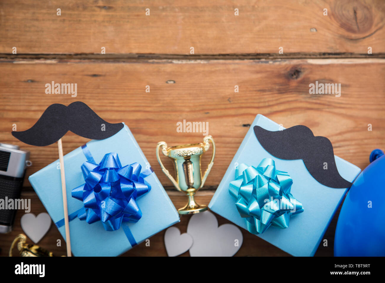 Father's Day background concept with presents, mustache and trophy ...