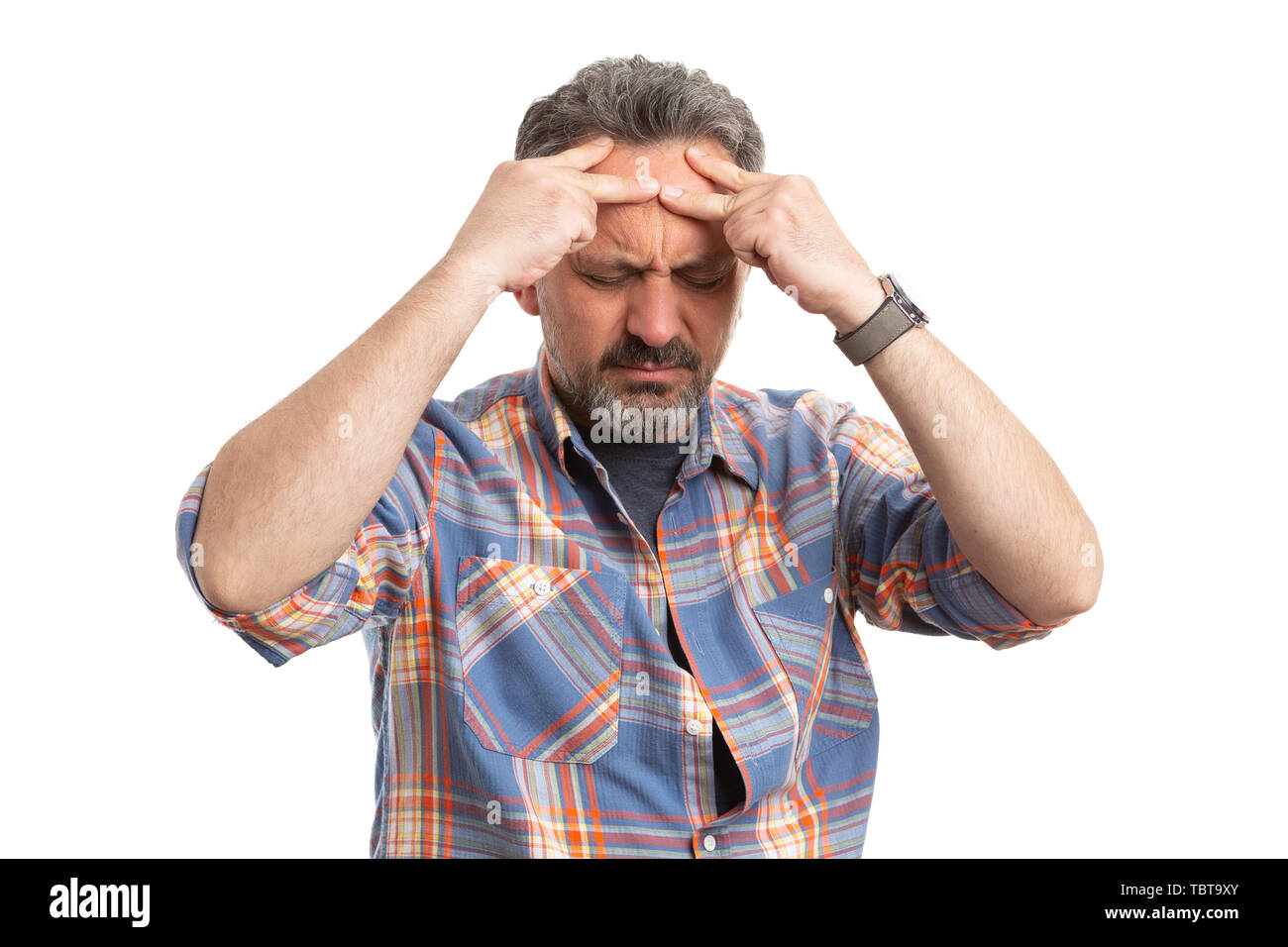 Man touching forehead with fingers as having headache isolated on white ...