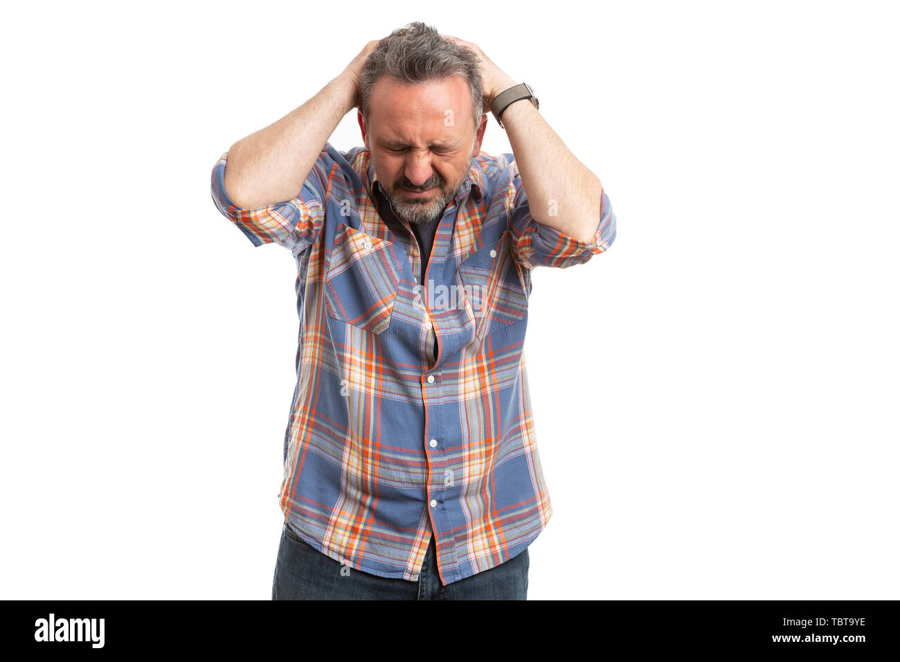 Man holding hands on head as painful headache concept isolated on white ...