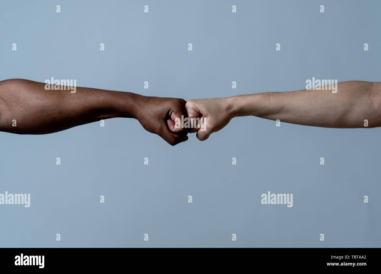 Black African American race male and white Caucasian woman hands giving ...